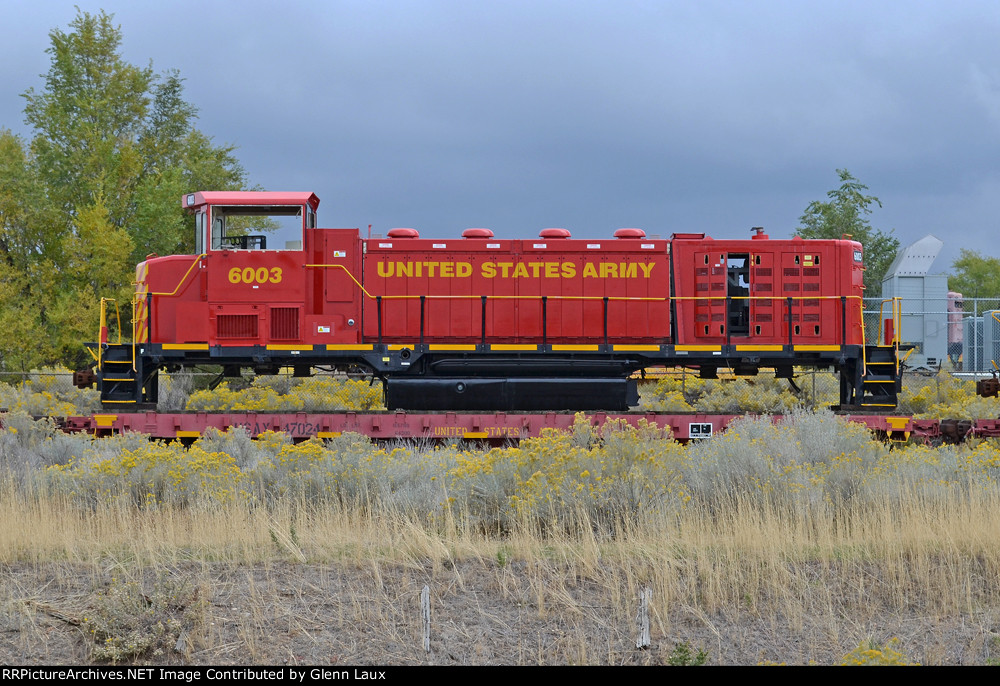 USAX 6003 sitting on USAX 47024 flatcar